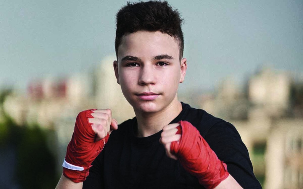 Young,Teenage,Kickboxer,Fighter,Training,On,The,Roof,With,Buildings ...